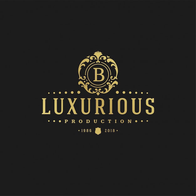 Ornate Golden Monogram Insignia on Elegant Black Background | Jiffy Designs
