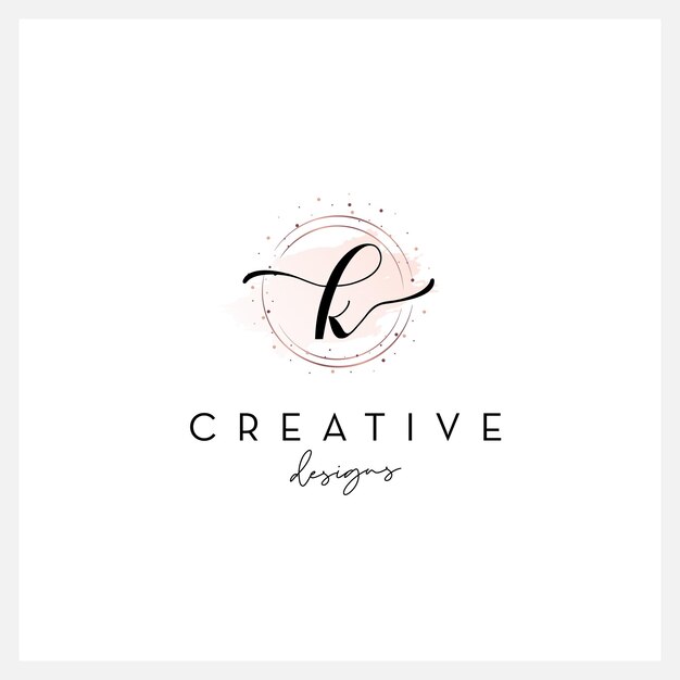Elegant Cursive Monogram with Artistic Flourishes and Dots | Jiffy Designs