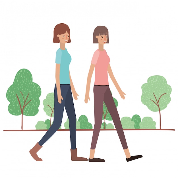 Two Women Walking Together in a Casual Park Setting | Jiffy Designs