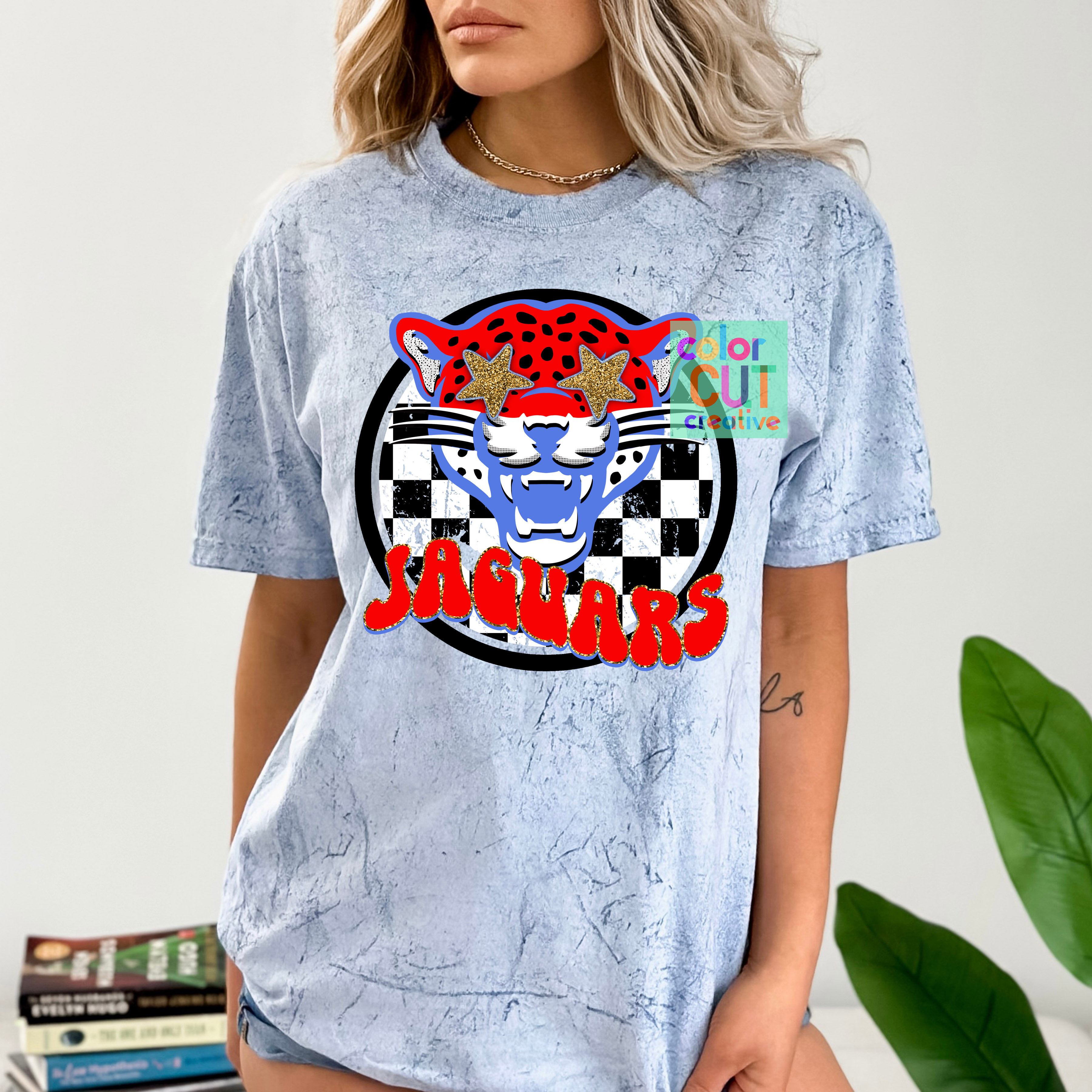 'Jaguars' Fierce Feline Face with Vibrant Colors and Checkered Pattern ...